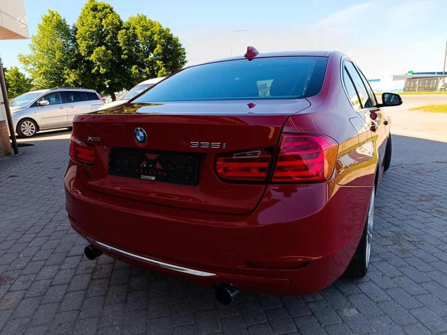 Red BMW 335 2013 in Kretinga, with an engine capacity of 2.98 L and mileage of 217 thousand km for 12200 €, photo 6 on AUTOMOTO.COM.LV