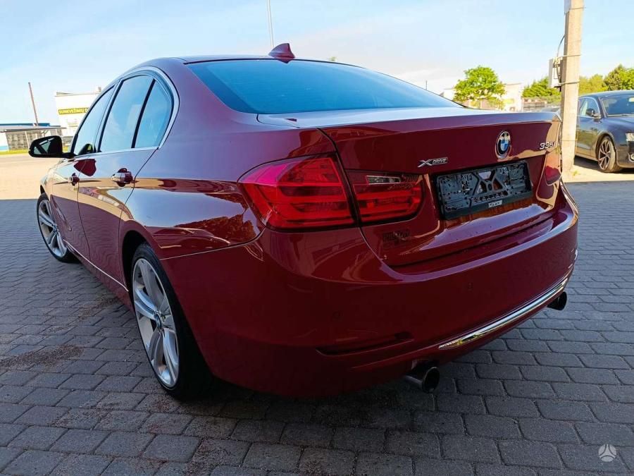 Red BMW 335 2013 in Kretinga, with an engine capacity of 2.98 L and mileage of 217 thousand km for 12200 €, photo 7 on AUTOMOTO.COM.LV