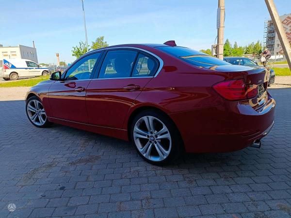 Red BMW 335 2013 in Kretinga, with an engine capacity of 2.98 L and mileage of 217 thousand km for 12200 €, photo 7 on AUTOMOTO.COM.LV