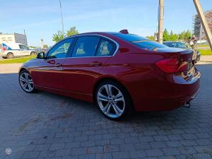 Red BMW 335 2013 in Kretinga, with an engine capacity of 2.98 L and mileage of 217 thousand km for 12200 €, photo 8 on AUTOMOTO.COM.LV