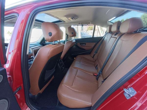 Red BMW 335 2013 in Kretinga, with an engine capacity of 2.98 L and mileage of 217 thousand km for 12200 €, photo 10 on AUTOMOTO.COM.LV