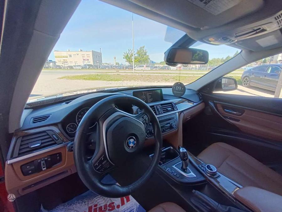 Red BMW 335 2013 in Kretinga, with an engine capacity of 2.98 L and mileage of 217 thousand km for 12200 €, photo 12 on AUTOMOTO.COM.LV