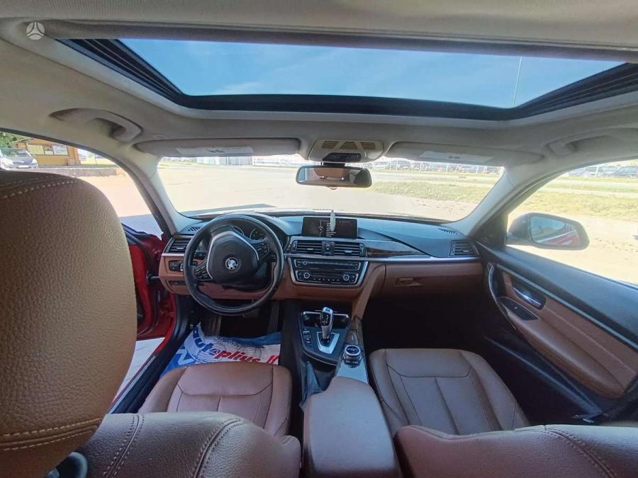 Red BMW 335 2013 in Kretinga, with an engine capacity of 2.98 L and mileage of 217 thousand km for 12200 €, photo 13 on AUTOMOTO.COM.LV