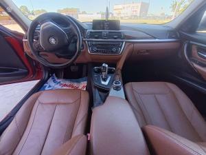 Red BMW 335 2013 in Kretinga, with an engine capacity of 2.98 L and mileage of 217 thousand km for 12200 €, photo 14 on AUTOMOTO.COM.LV