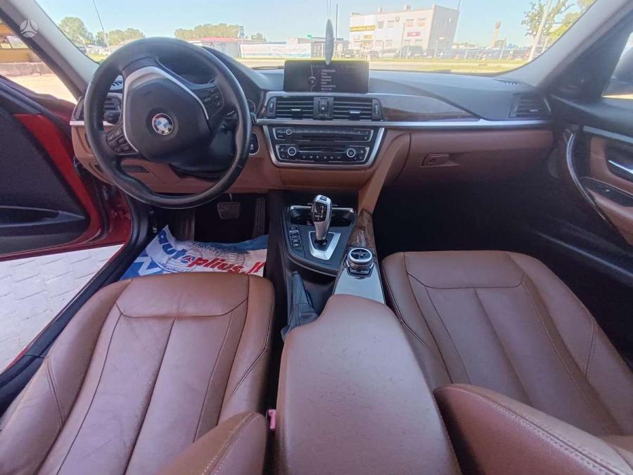 Red BMW 335 2013 in Kretinga, with an engine capacity of 2.98 L and mileage of 217 thousand km for 12200 €, photo 14 on AUTOMOTO.COM.LV