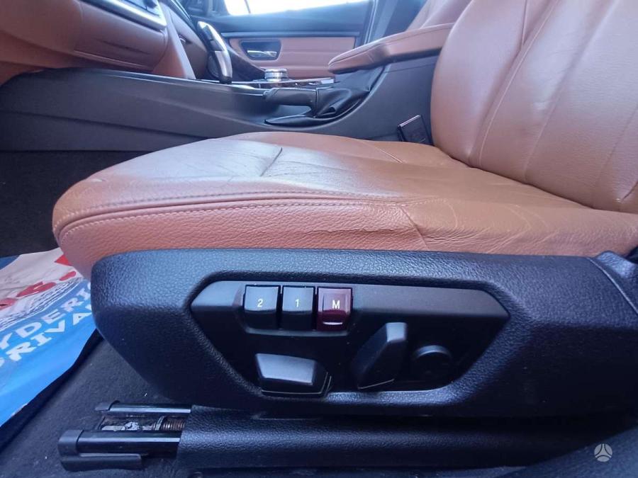 Red BMW 335 2013 in Kretinga, with an engine capacity of 2.98 L and mileage of 217 thousand km for 12200 €, photo 15 on AUTOMOTO.COM.LV