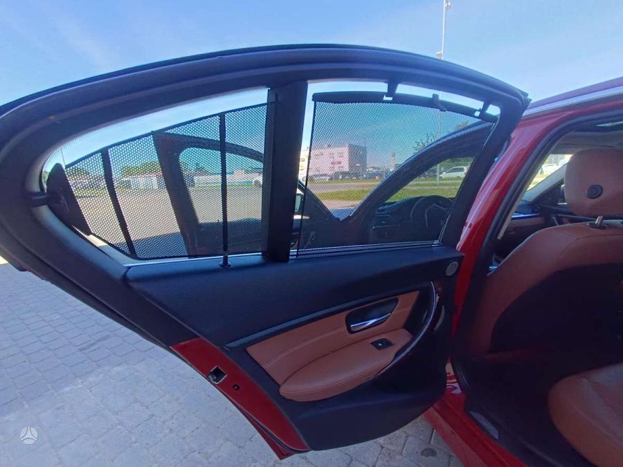 Red BMW 335 2013 in Kretinga, with an engine capacity of 2.98 L and mileage of 217 thousand km for 12200 €, photo 16 on AUTOMOTO.COM.LV