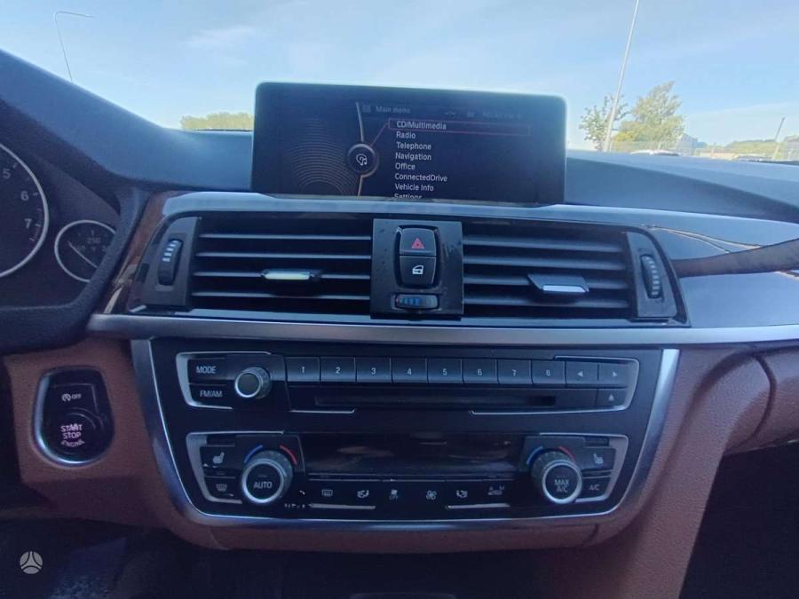 Red BMW 335 2013 in Kretinga, with an engine capacity of 2.98 L and mileage of 217 thousand km for 12200 €, photo 18 on AUTOMOTO.COM.LV