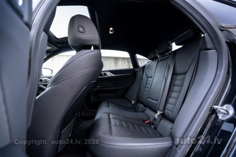 Black BMW 4 Series 2023 in Tartu, with an engine capacity of 3.00 L and mileage of 90 thousand km for 41900 €, photo 14 on AUTOMOTO.COM.LV