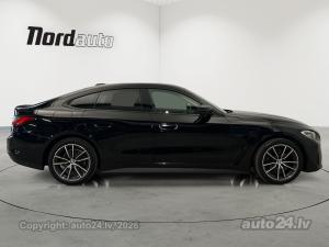 Black BMW 4 Series 2021 in Tallinn, with an engine capacity of 2.00 L and mileage of 160 thousand km for 29900 €, photo 6 on AUTOMOTO.COM.LV