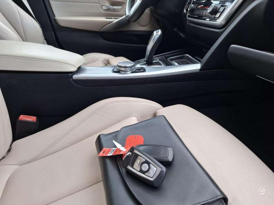 Blue BMW 418 Gran Coupe 2015 in Utena, with an engine capacity of 2.00 L and mileage of 244 thousand km for 10950 €, photo 15 on AUTOMOTO.COM.LV