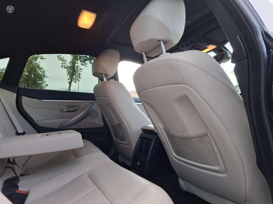 Blue BMW 418 Gran Coupe 2015 in Utena, with an engine capacity of 2.00 L and mileage of 244 thousand km for 10950 €, photo 17 on AUTOMOTO.COM.LV