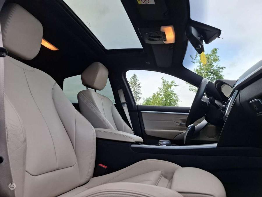 Blue BMW 418 Gran Coupe 2015 in Utena, with an engine capacity of 2.00 L and mileage of 244 thousand km for 10950 €, photo 18 on AUTOMOTO.COM.LV