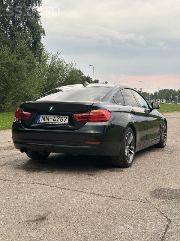 Black BMW 430 2015 in Riga, with an engine capacity of 3.00 L and mileage of 284 thousand km for 13499 €, photo 5 on AUTOMOTO.COM.LV