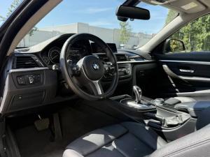 Black BMW 430 2016 in Riga, with an engine capacity of 3.00 L and mileage of 183 thousand km for 19900 €, photo 15 on AUTOMOTO.COM.LV