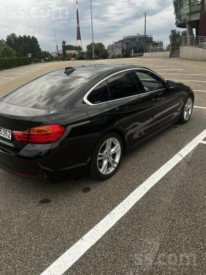 Black BMW 430 2016 in Riga, with an engine capacity of 3.00 L and mileage of 292 thousand km for 18000 €, photo 7 on AUTOMOTO.COM.LV