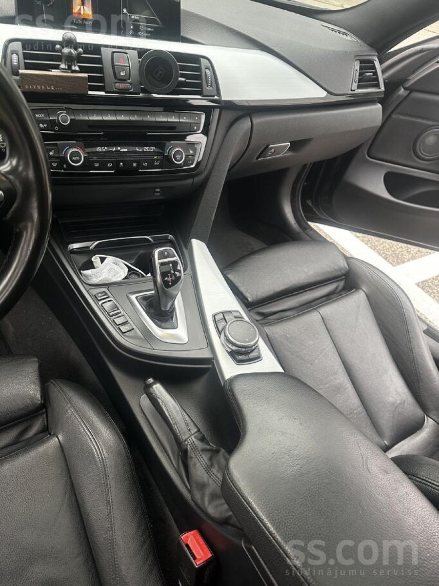 Black BMW 430 2016 in Riga, with an engine capacity of 3.00 L and mileage of 292 thousand km for 18000 €, photo 14 on AUTOMOTO.COM.LV