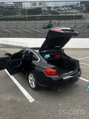 Black BMW 430 2016 in Riga, with an engine capacity of 3.00 L and mileage of 292 thousand km for 18000 €, photo 19 on AUTOMOTO.COM.LV