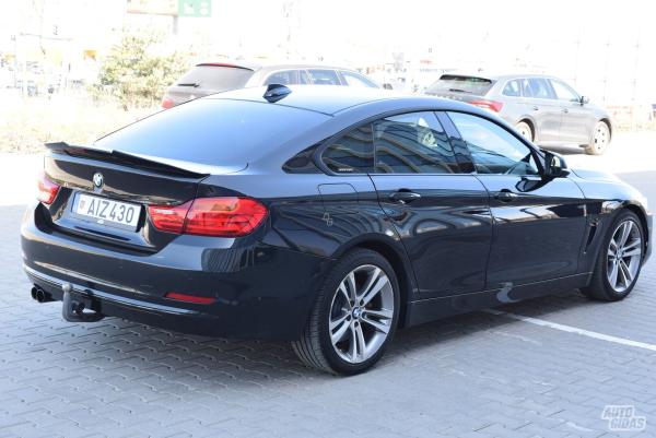 Black BMW 430 Gran Coupe 2015 in Vilnius, with an engine capacity of 3.00 L and mileage of 249 thousand km for 14350 €, photo 4 on AUTOMOTO.COM.LV