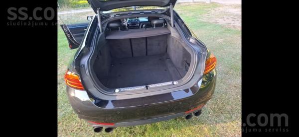 Black BMW 435 2014 in Riga, with an engine capacity of 3.50 L and mileage of 167 thousand km for 24000 €, photo 3 on AUTOMOTO.COM.LV