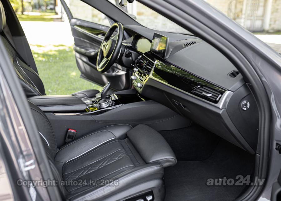 Beige BMW 5 Series 2019 in Tallinn, with an engine capacity of 2.00 L and mileage of 66 thousand km for 38000 €, photo 19 on AUTOMOTO.COM.LV