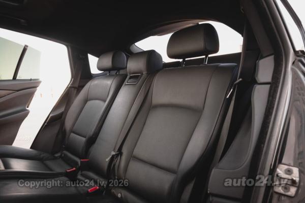 Black BMW 5 Series 2010 in Tartu, with an engine capacity of 3.00 L and mileage of 440 thousand km for 5999 €, photo 11 on AUTOMOTO.COM.LV