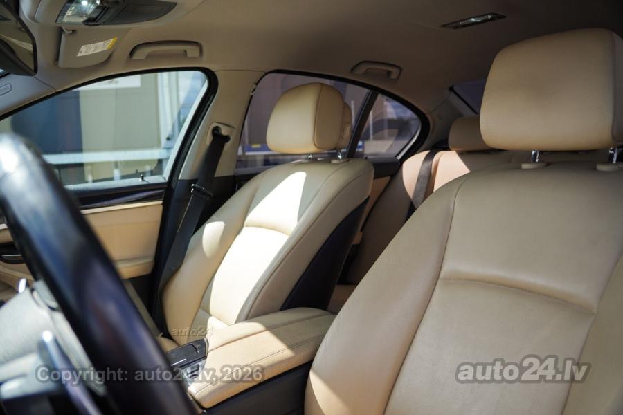 Black BMW 5 Series 2010 in Tallinn, with an engine capacity of 3.00 L and mileage of 271 thousand km for 10990 €, photo 15 on AUTOMOTO.COM.LV