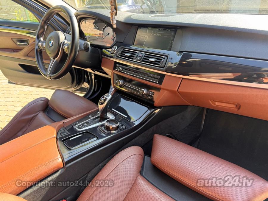 Black BMW 5 Series 2011 in Sillamae, with an engine capacity of 3.00 L and mileage of 334 thousand km for 12500 €, photo 12 on AUTOMOTO.COM.LV