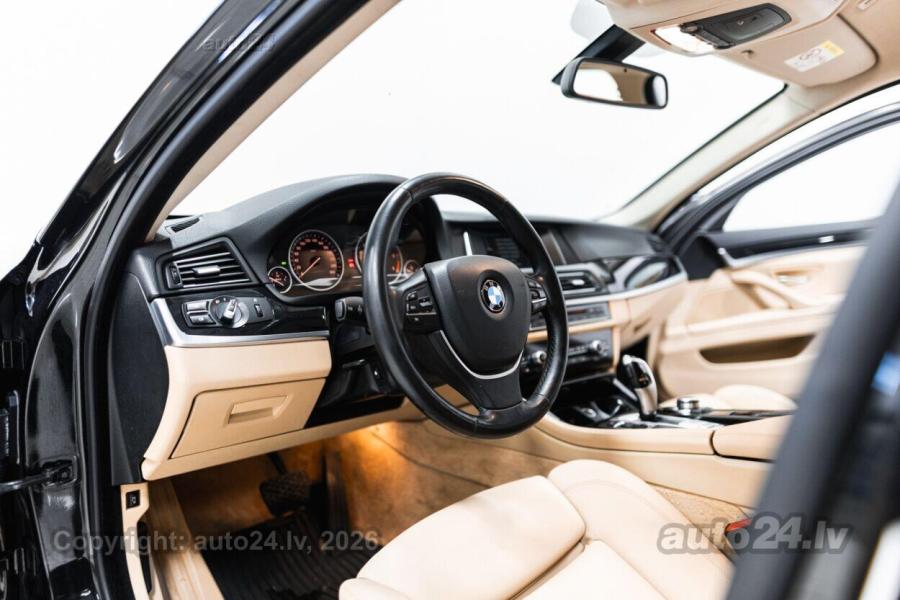 Black BMW 5 Series 2014 in Tallinn, with an engine capacity of 2.00 L and mileage of 254 thousand km for 10990 €, photo 11 on AUTOMOTO.COM.LV