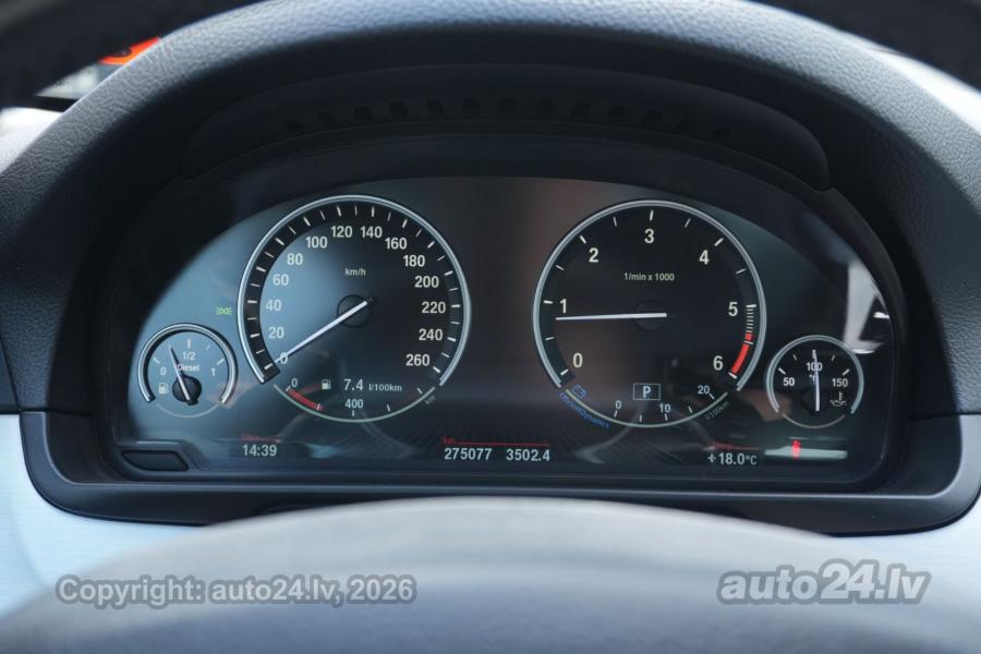 Black BMW 5 Series 2014 in Riga, with an engine capacity of 2.00 L and mileage of 275 thousand km for 11490 €, photo 18 on AUTOMOTO.COM.LV