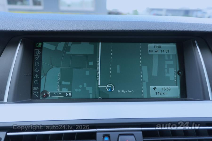 Black BMW 5 Series 2014 in Riga, with an engine capacity of 2.00 L and mileage of 275 thousand km for 11490 €, photo 20 on AUTOMOTO.COM.LV