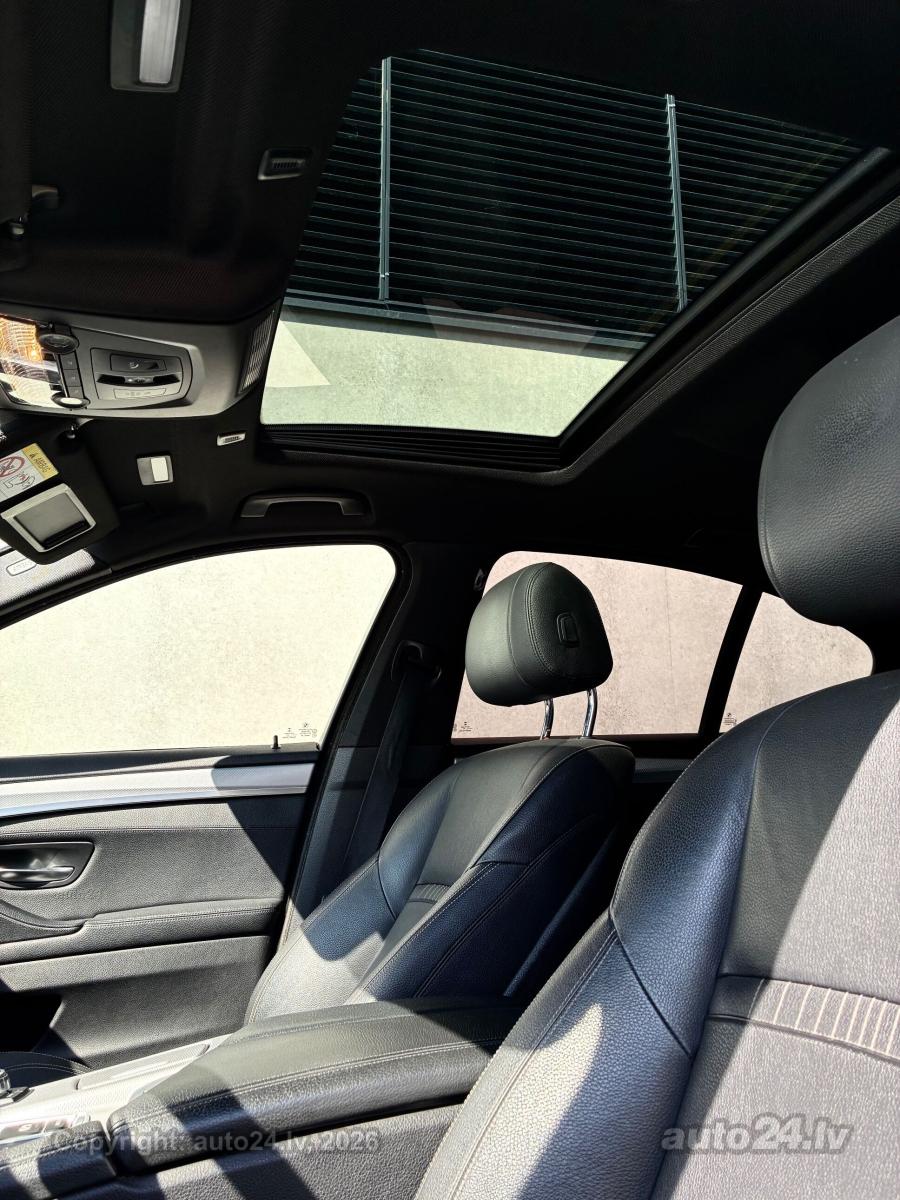 Black BMW 5 Series 2015 in Tartu, with an engine capacity of 2.00 L and mileage of 200 thousand km for 12999 €, photo 12 on AUTOMOTO.COM.LV
