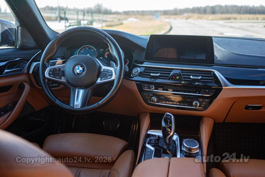 Black BMW 5 Series 2017 in Tallinn, with an engine capacity of 2.00 L and mileage of 215 thousand km for 27300 €, photo 17 on AUTOMOTO.COM.LV
