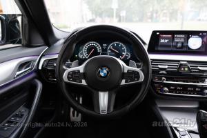 Black BMW 5 Series 2017 in Tallinn, with an engine capacity of 3.00 L and mileage of 195 thousand km for 27900 €, photo 21 on AUTOMOTO.COM.LV