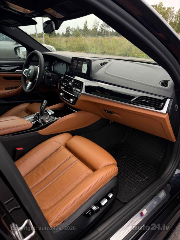 Black BMW 5 Series 2017 in Tartu, with an engine capacity of 2.00 L and mileage of 225 thousand km for 25990 €, photo 11 on AUTOMOTO.COM.LV
