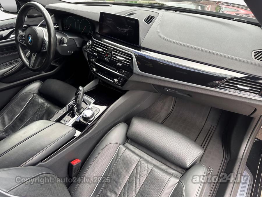 Black BMW 5 Series 2018 in Riga, with an engine capacity of 3.00 L and mileage of 135 thousand km for 32990 €, photo 6 on AUTOMOTO.COM.LV