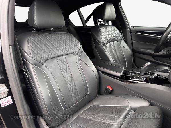 Black BMW 5 Series 2018 in Riga, with an engine capacity of 3.00 L and mileage of 135 thousand km for 32990 €, photo 7 on AUTOMOTO.COM.LV
