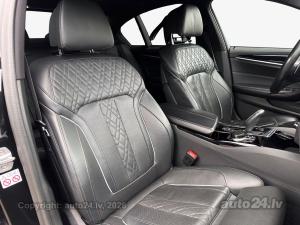 Black BMW 5 Series 2018 in Riga, with an engine capacity of 3.00 L and mileage of 135 thousand km for 32990 €, photo 7 on AUTOMOTO.COM.LV