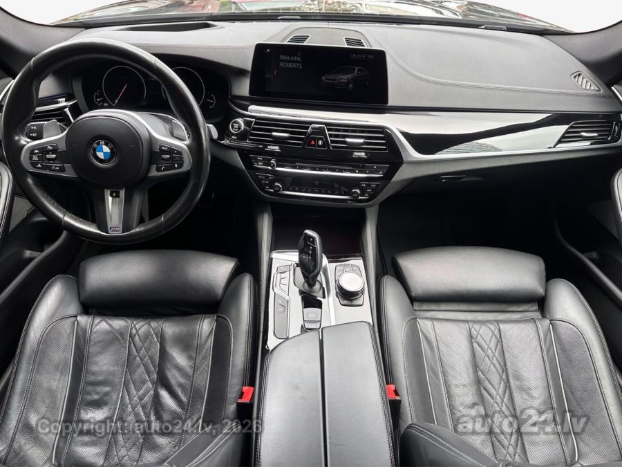Black BMW 5 Series 2018 in Riga, with an engine capacity of 3.00 L and mileage of 135 thousand km for 32990 €, photo 8 on AUTOMOTO.COM.LV