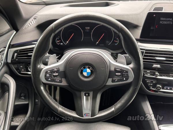 Black BMW 5 Series 2018 in Riga, with an engine capacity of 3.00 L and mileage of 135 thousand km for 32990 €, photo 9 on AUTOMOTO.COM.LV