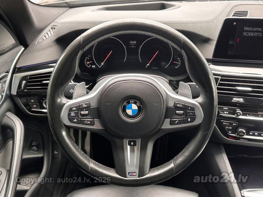Black BMW 5 Series 2018 in Riga, with an engine capacity of 3.00 L and mileage of 135 thousand km for 32990 €, photo 9 on AUTOMOTO.COM.LV