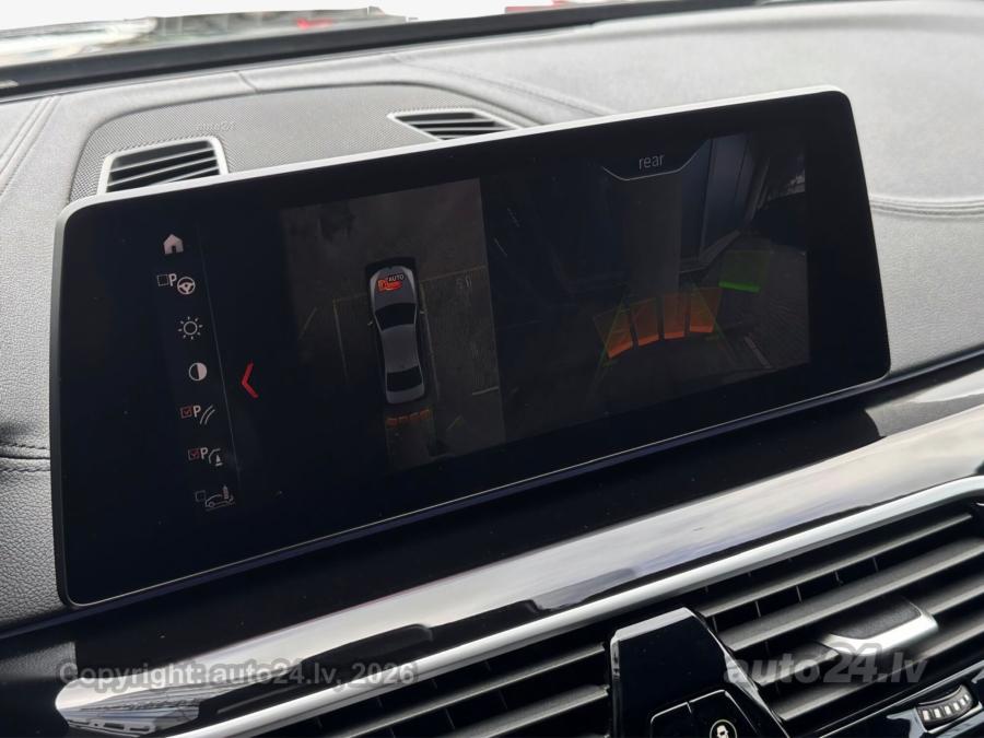 Black BMW 5 Series 2018 in Riga, with an engine capacity of 3.00 L and mileage of 135 thousand km for 32990 €, photo 13 on AUTOMOTO.COM.LV