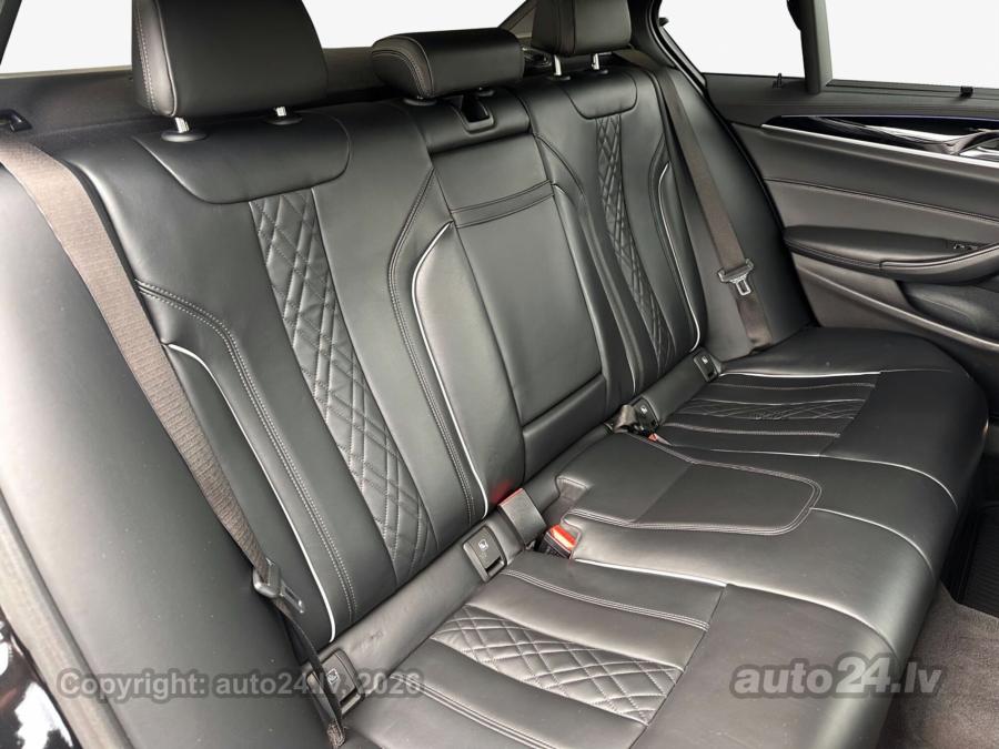 Black BMW 5 Series 2018 in Riga, with an engine capacity of 3.00 L and mileage of 135 thousand km for 32990 €, photo 16 on AUTOMOTO.COM.LV