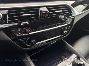 Black BMW 5 Series 2018 in Riga, with an engine capacity of 3.00 L and mileage of 135 thousand km for 32990 €, photo 20 on AUTOMOTO.COM.LV