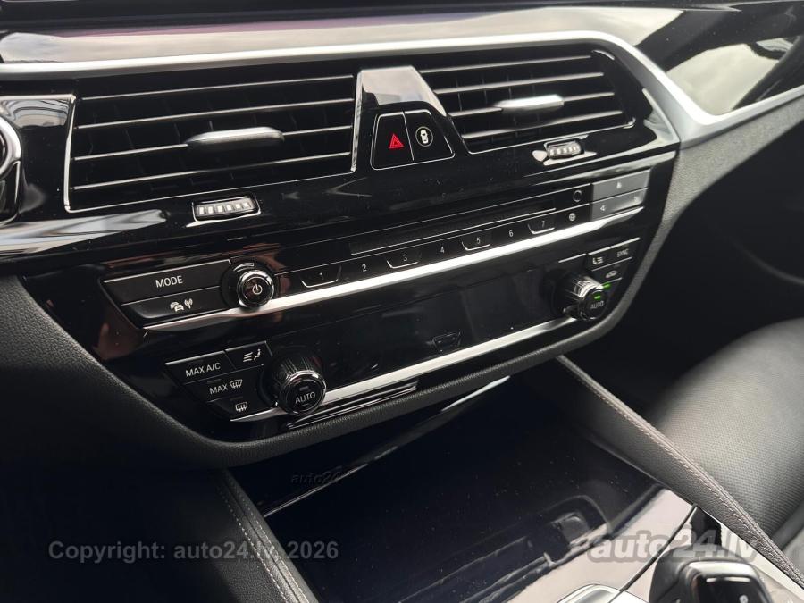Black BMW 5 Series 2018 in Riga, with an engine capacity of 3.00 L and mileage of 135 thousand km for 32990 €, photo 20 on AUTOMOTO.COM.LV