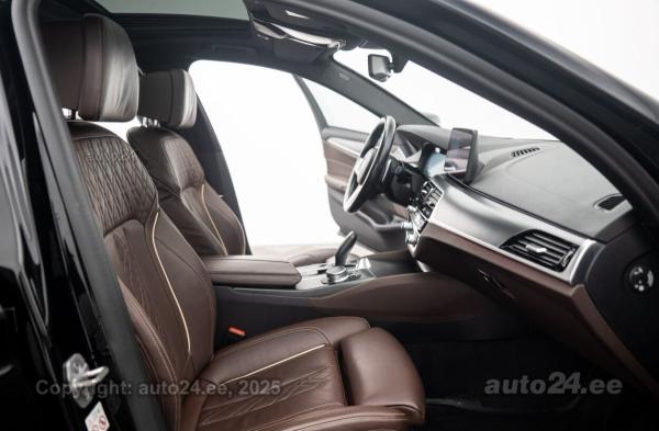 Black BMW 5 Series 2021 in Tallinn, with an engine capacity of 3.00 L and mileage of 99 thousand km for 42899 €, photo 11 on AUTOMOTO.COM.LV