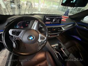 Black BMW 5 Series 2021 in Tallinn, with an engine capacity of 3.00 L and mileage of 116 thousand km for 39900 €, photo 7 on AUTOMOTO.COM.LV