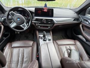 Black BMW 5 Series 2021 in Tallinn, with an engine capacity of 3.00 L and mileage of 116 thousand km for 39900 €, photo 8 on AUTOMOTO.COM.LV