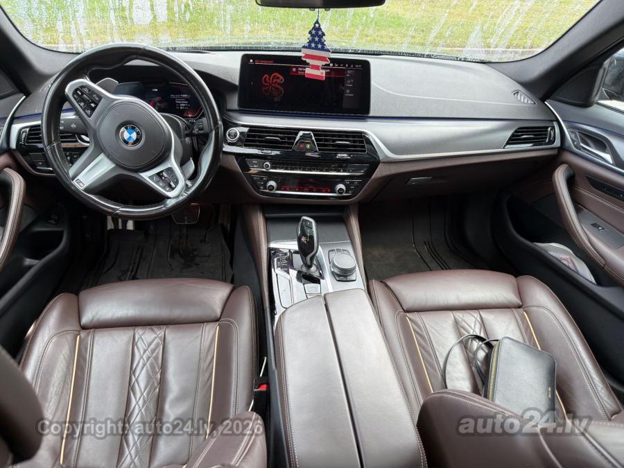 Black BMW 5 Series 2021 in Tallinn, with an engine capacity of 3.00 L and mileage of 116 thousand km for 39900 €, photo 8 on AUTOMOTO.COM.LV
