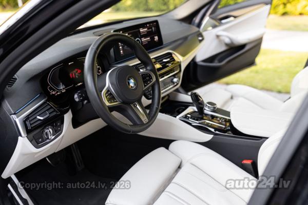 Black BMW 5 Series 2021 in Tallinn, with an engine capacity of 2.00 L and mileage of 153 thousand km for 26900 €, photo 8 on AUTOMOTO.COM.LV